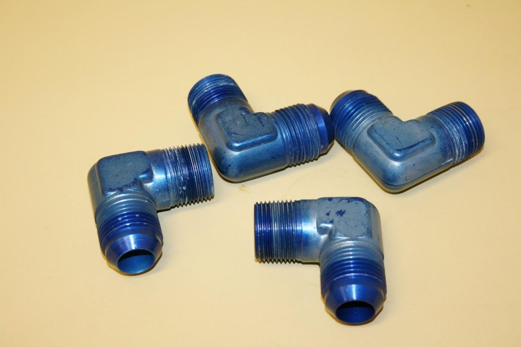 Used -12 To 3/4" NPT 90 Degree An Flare To Pipe Adpt.